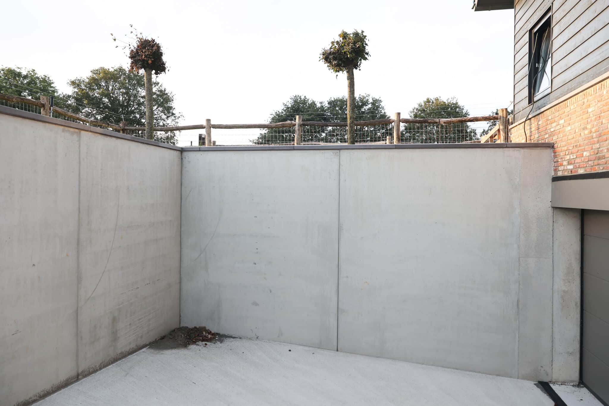 Retaining walls create solid ramp for underground garage | Bosch Beton